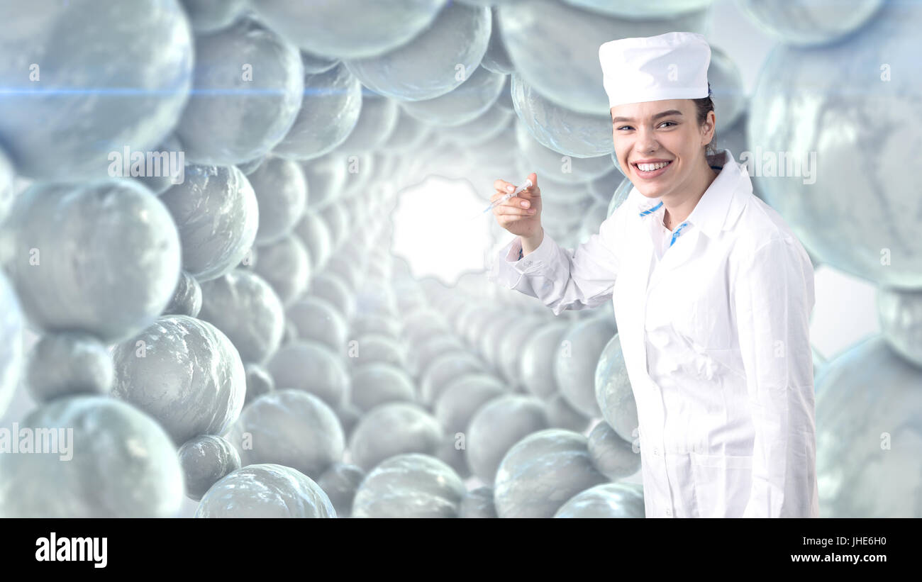 Beautiful medical woman doctor in uniform. Studio painted background ...