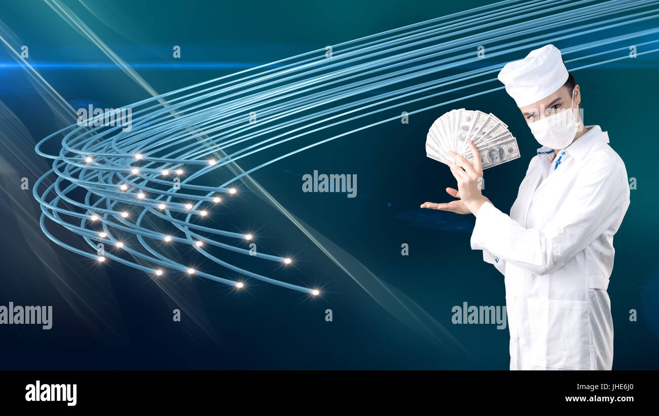 Beautiful medical woman doctor in uniform. Studio painted background ...