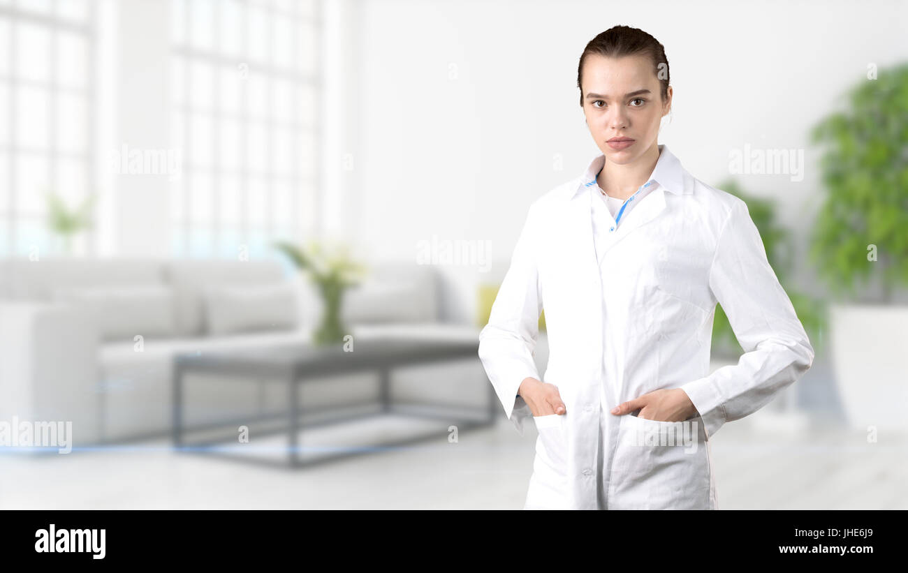 Beautiful medical woman doctor in uniform. Studio painted background ...