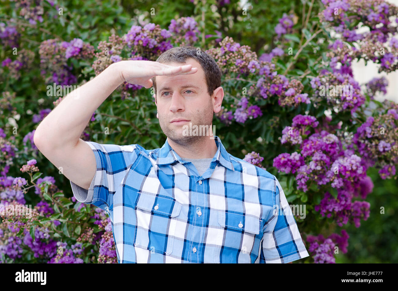 Optimistic man looking out hopeful for the future Stock Photo - Alamy
