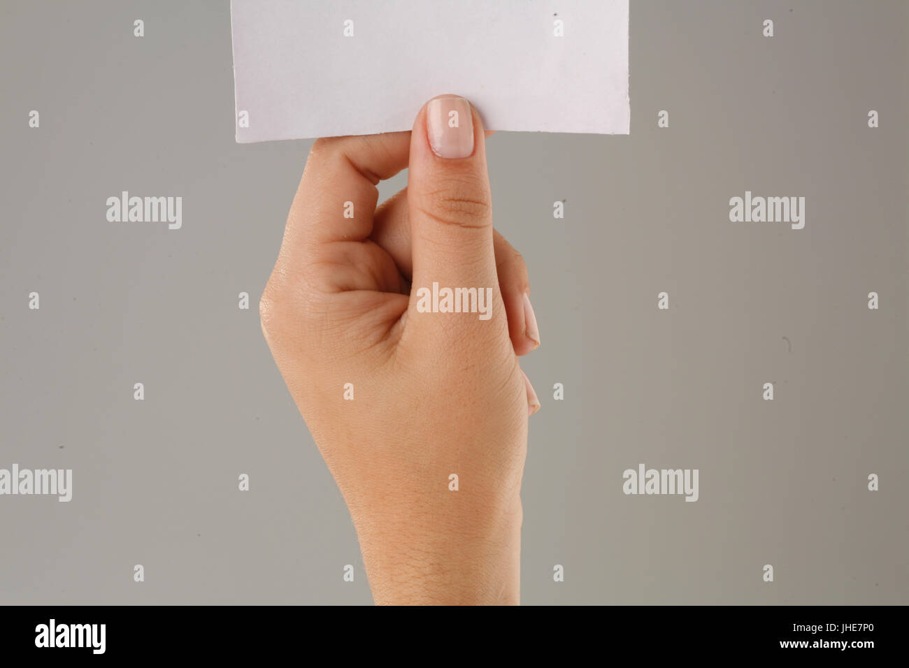 Female hand holding paper, Belém, Pará, Brazil Stock Photo - Alamy