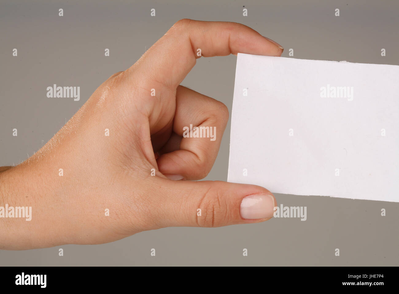 Female hand holding paper, Belém, Pará, Brazil Stock Photo - Alamy