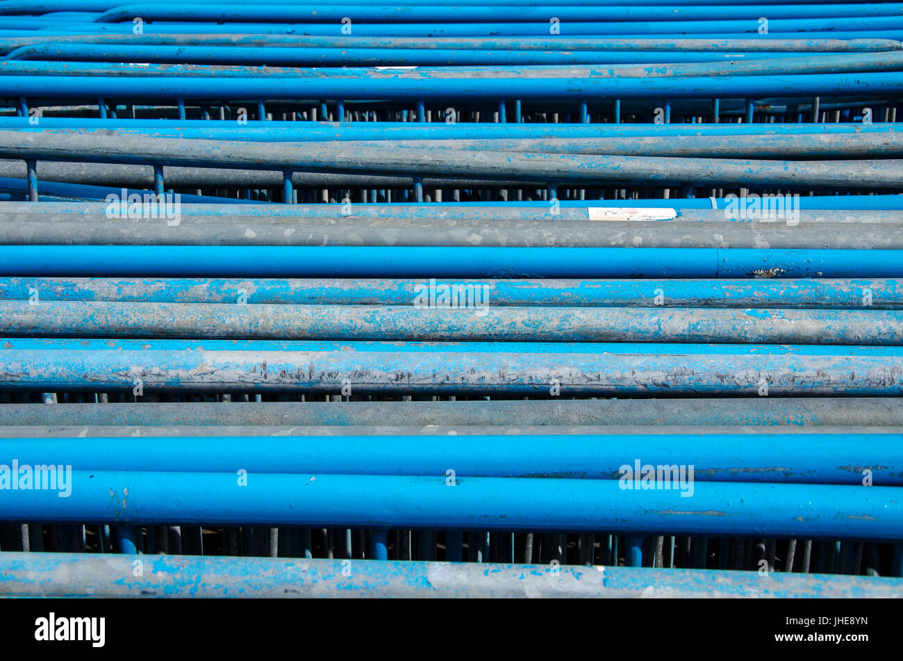 Horizontaly placed stainless steel tubes il blue color Stock Photo - Alamy