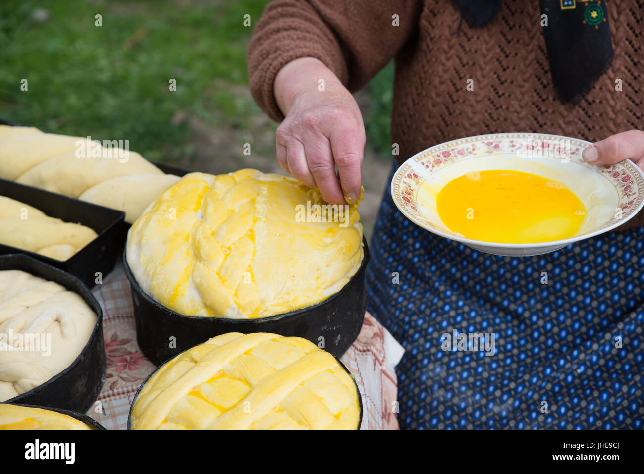 Preparing traditional Easter bread and cakes, Breb, Maramures, Romania ...