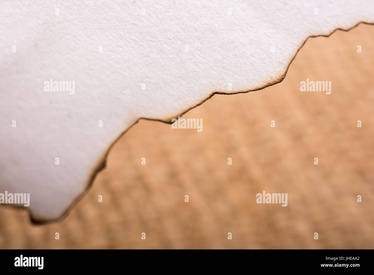 Paper with some burned edges Stock Photo - Alamy
