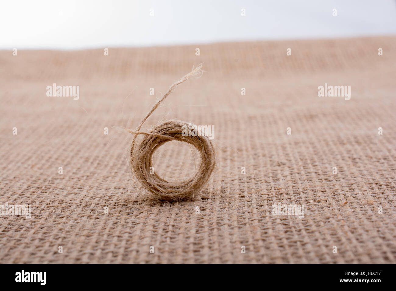 Roll of brown color linen string paper background Stock Photo - Alamy