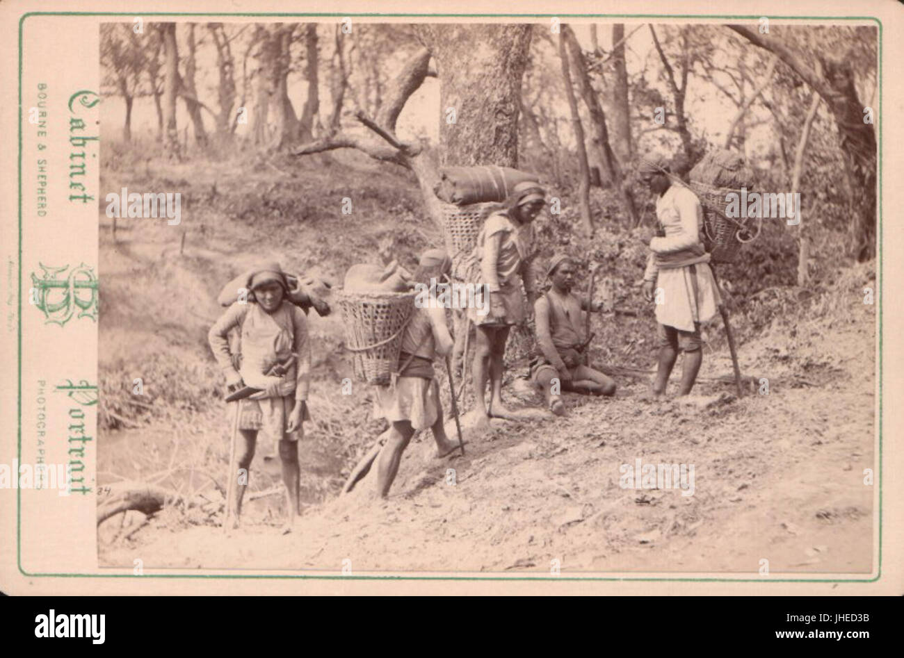 Nepalese people with wicker baskets and bush knives in 1875 Stock Photo ...