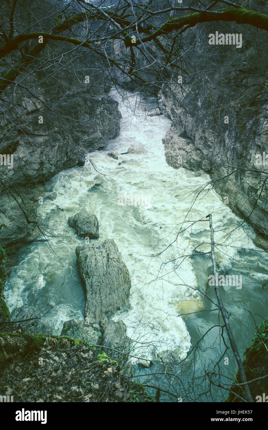 Mountain river view from above. The flow of water carries thoughts ...
