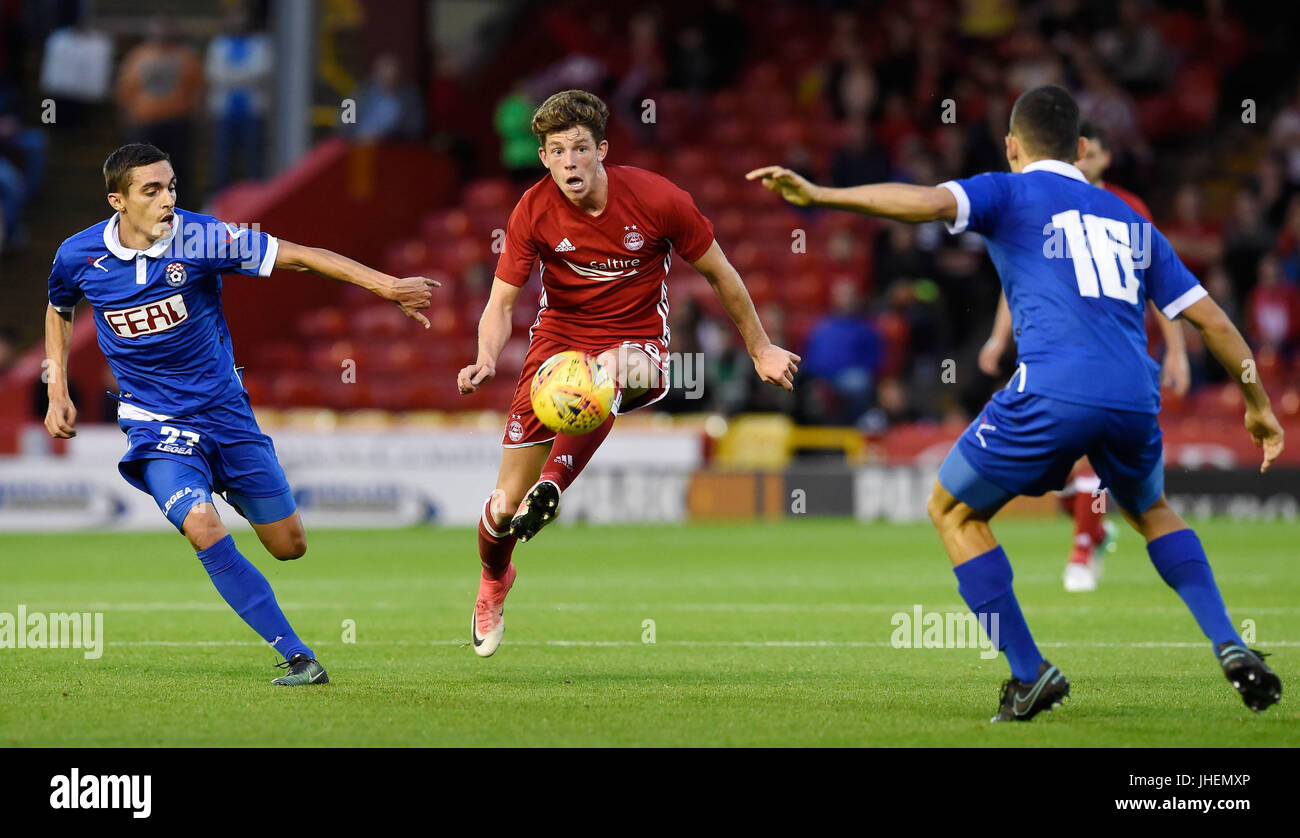 Aberdeen's Ryan Christie goes between Siroki Brijeg's Luka Begonja and ...