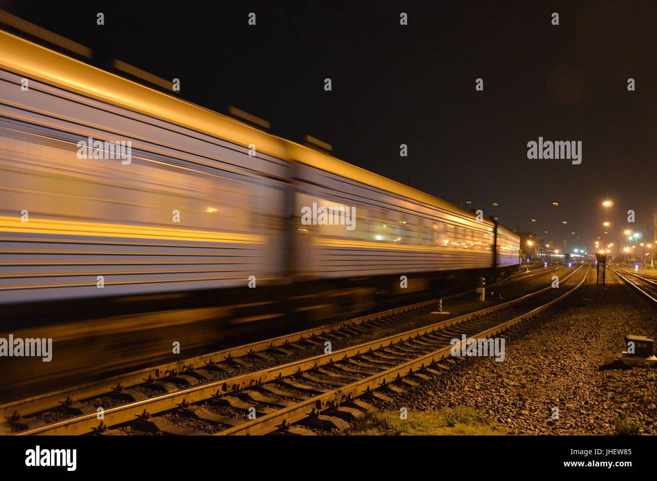 Passenger train on the move Stock Photo - Alamy
