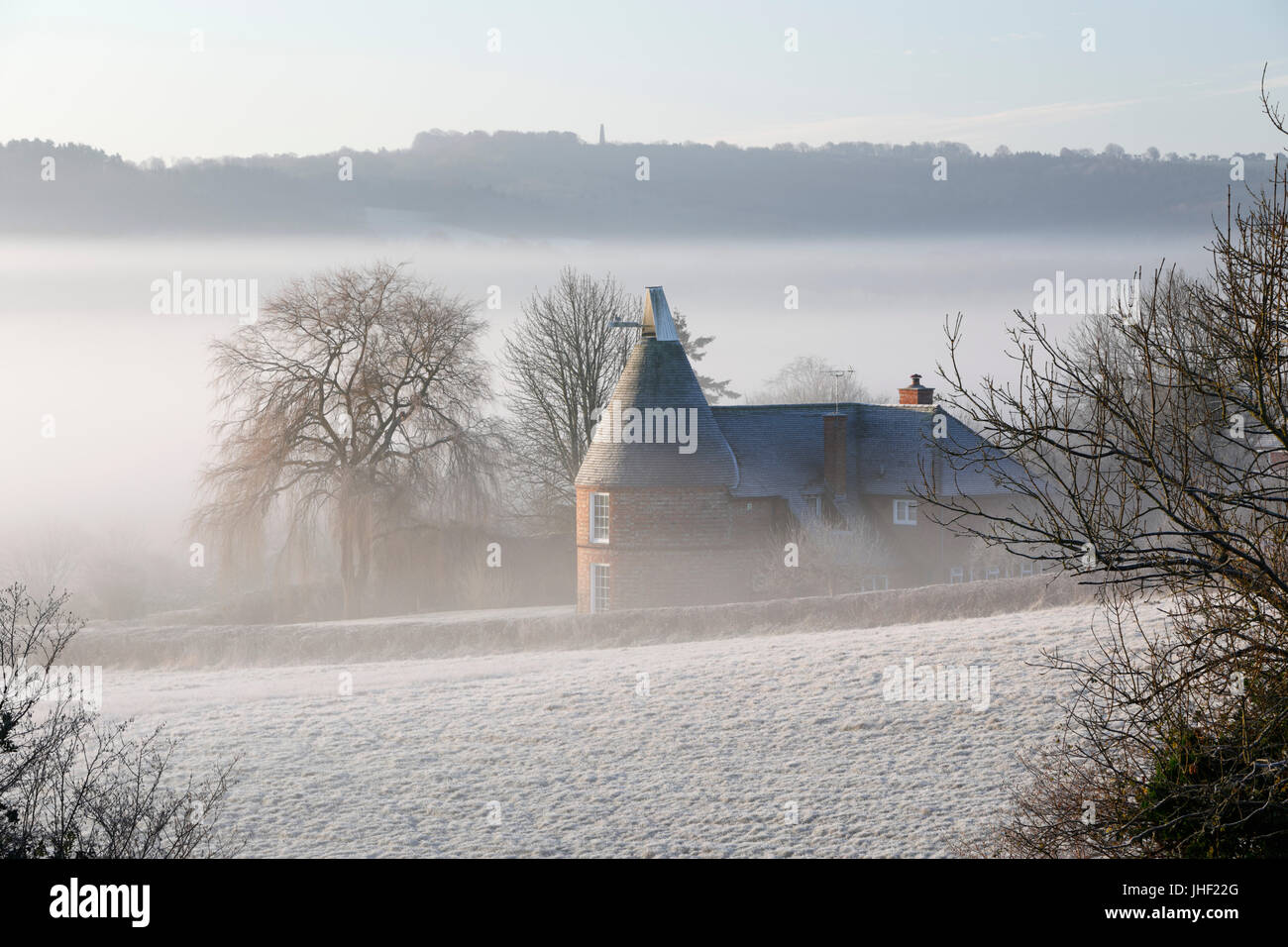 Old oast house in winter frost viewed from public footpath, Burwash ...