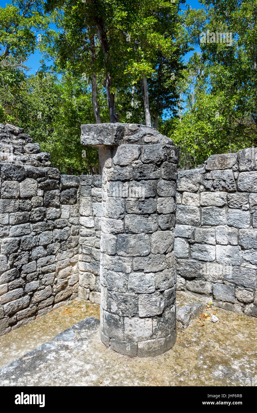 Ancient Mayan stone column in the ruins of Balamku, Mexico Stock Photo ...