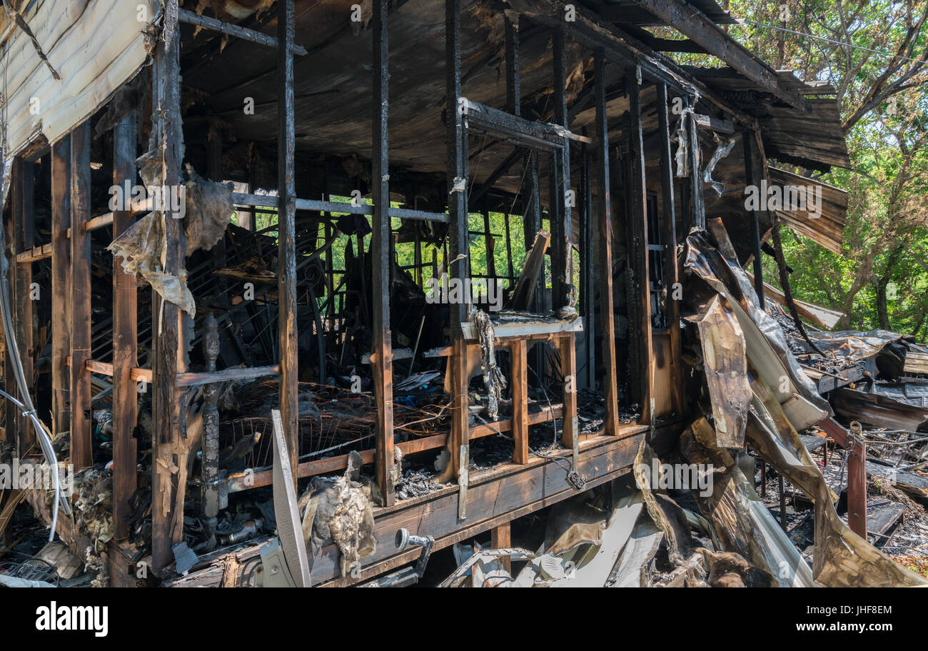 Burned ruins of wooden frame home Stock Photo - Alamy