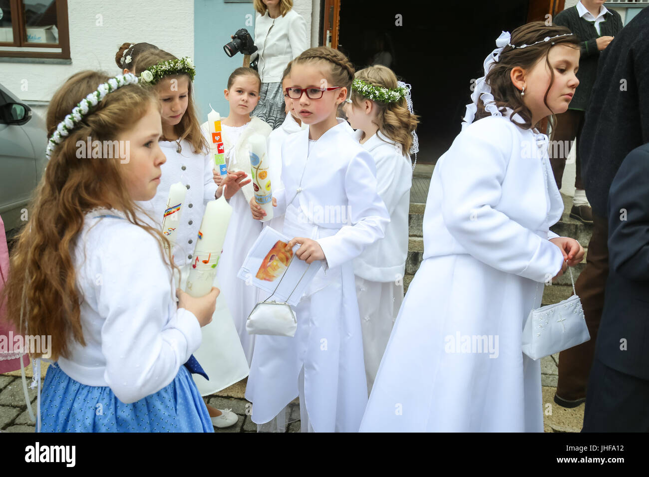 Group girls dressed for first communion hi-res stock photography and ...
