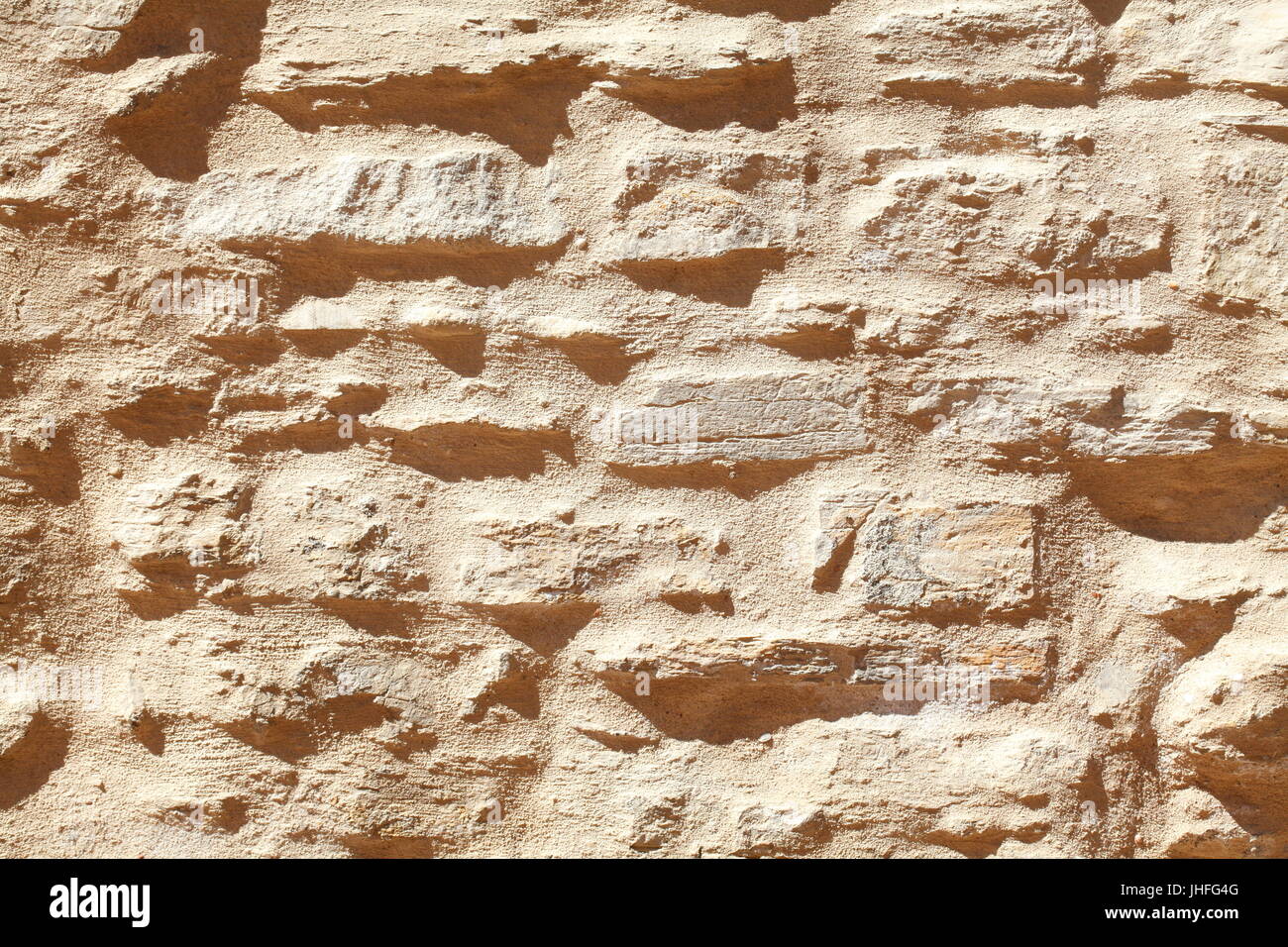 old brown stones from an old stone wall Stock Photo - Alamy