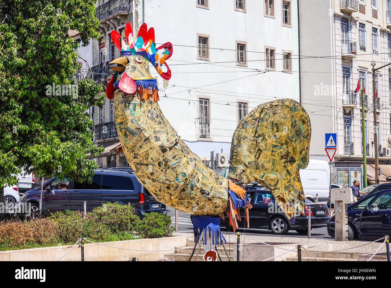 Street art at Martim Moniz Square in Lisbon - big rooster sculpture ...