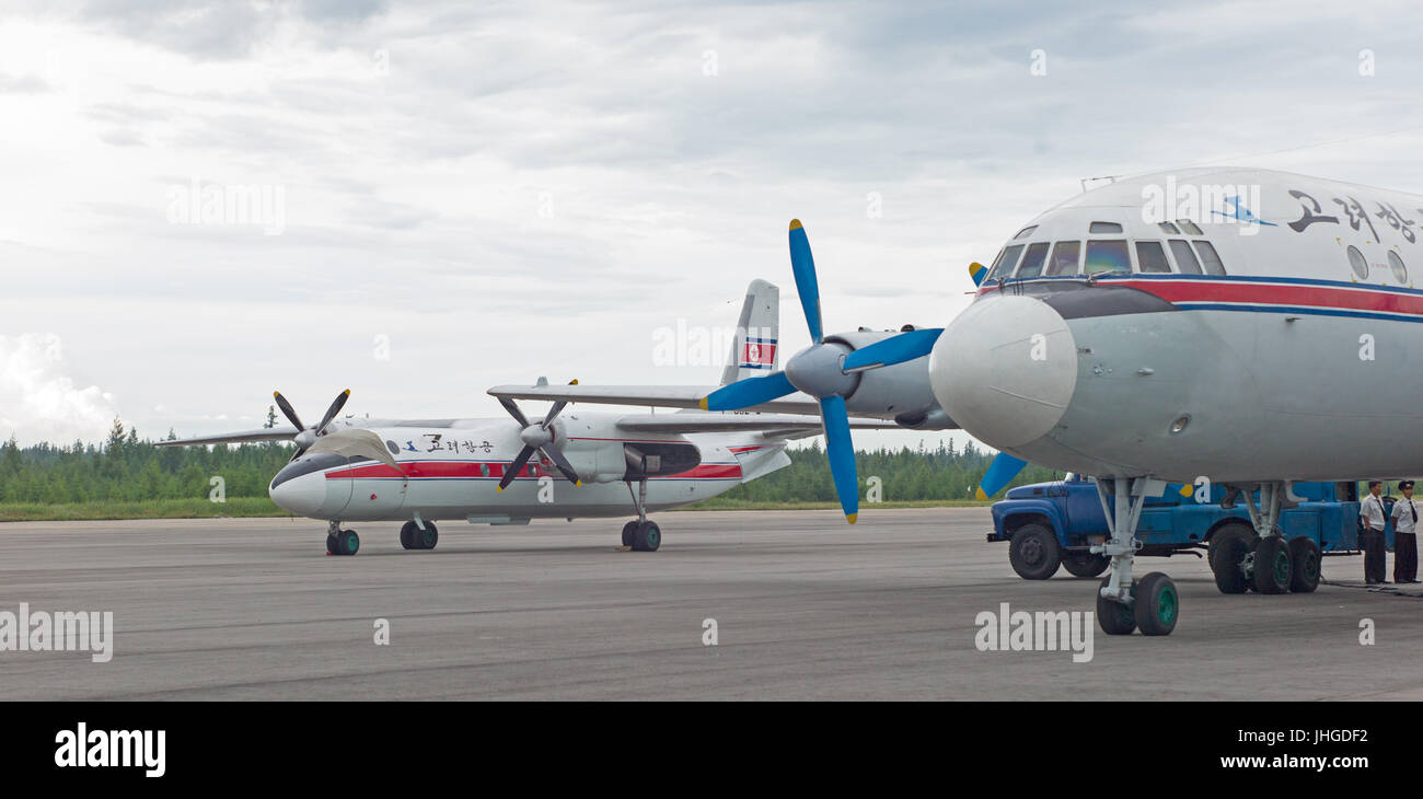 Air Koryo Antonov An-24B, with cover over cockpit windows, parked ...