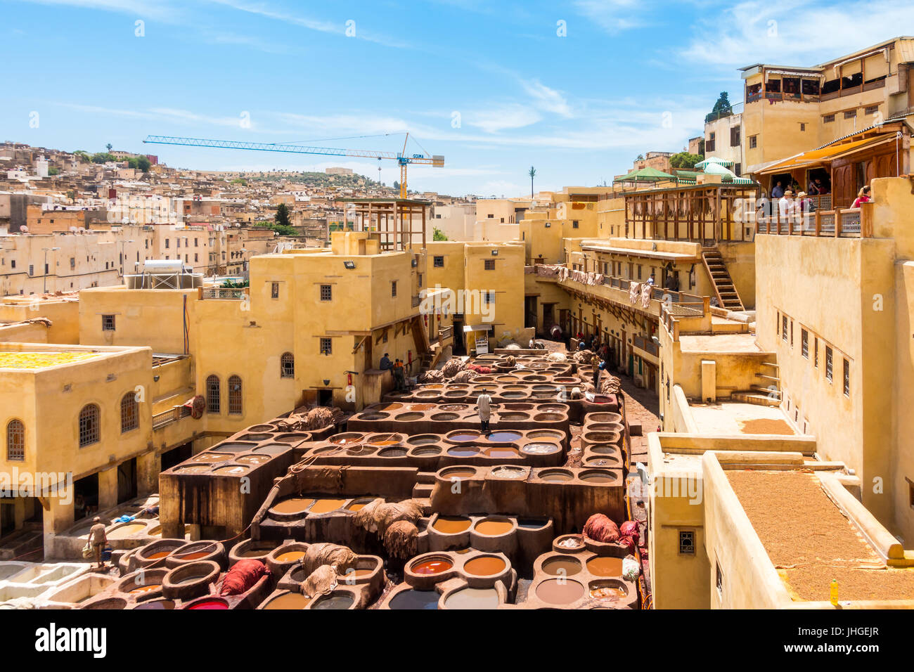 Fez, Morocco - May 07, 2017: Workers are dyeing leather at the tannery ...