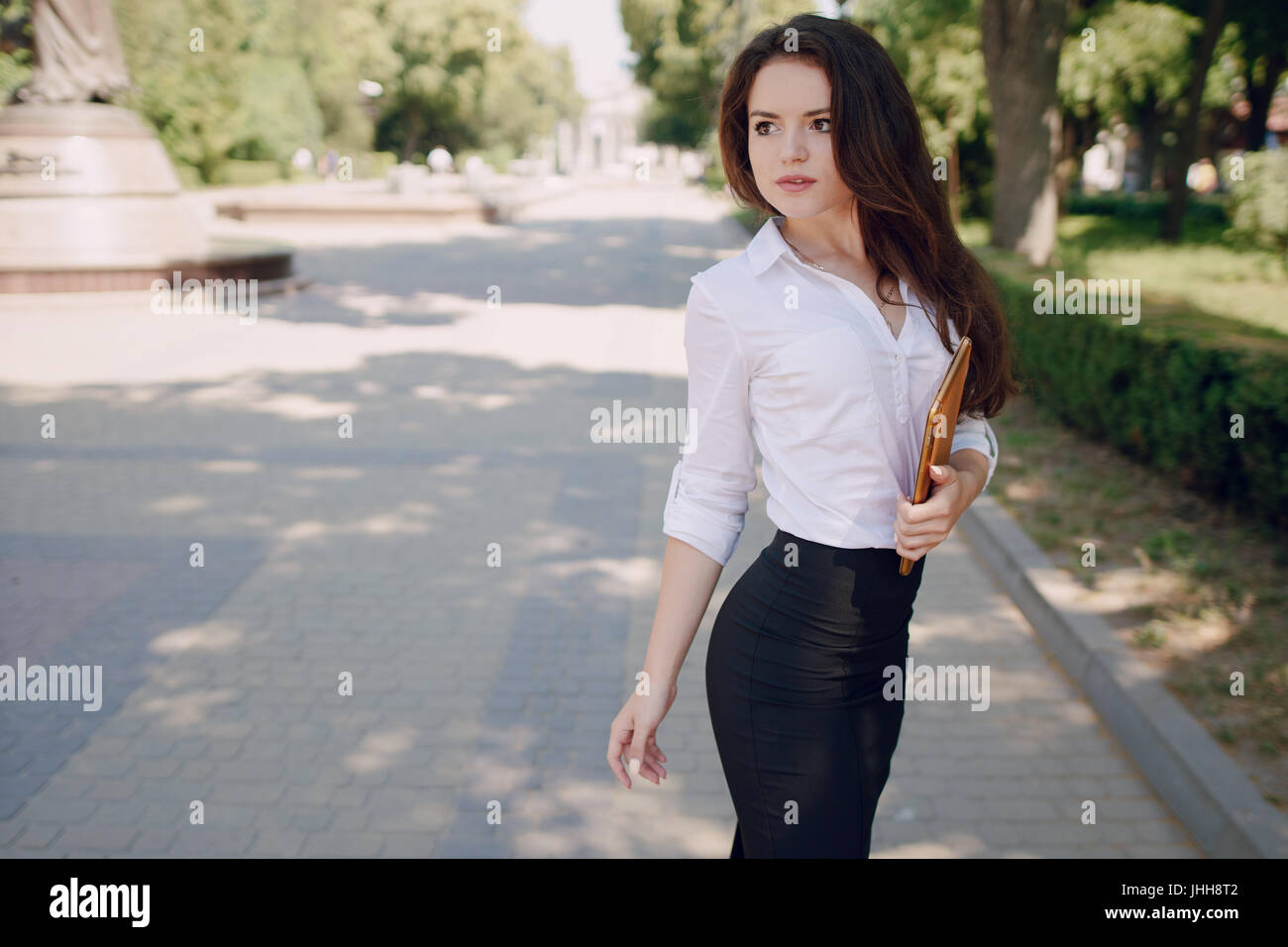 business woman enjoys gadgets Stock Photo - Alamy