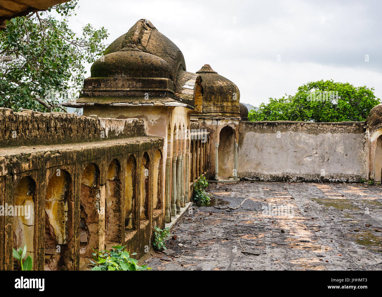 View of the ancient castle at forest in Jaipur, India. Jaipur is the ...