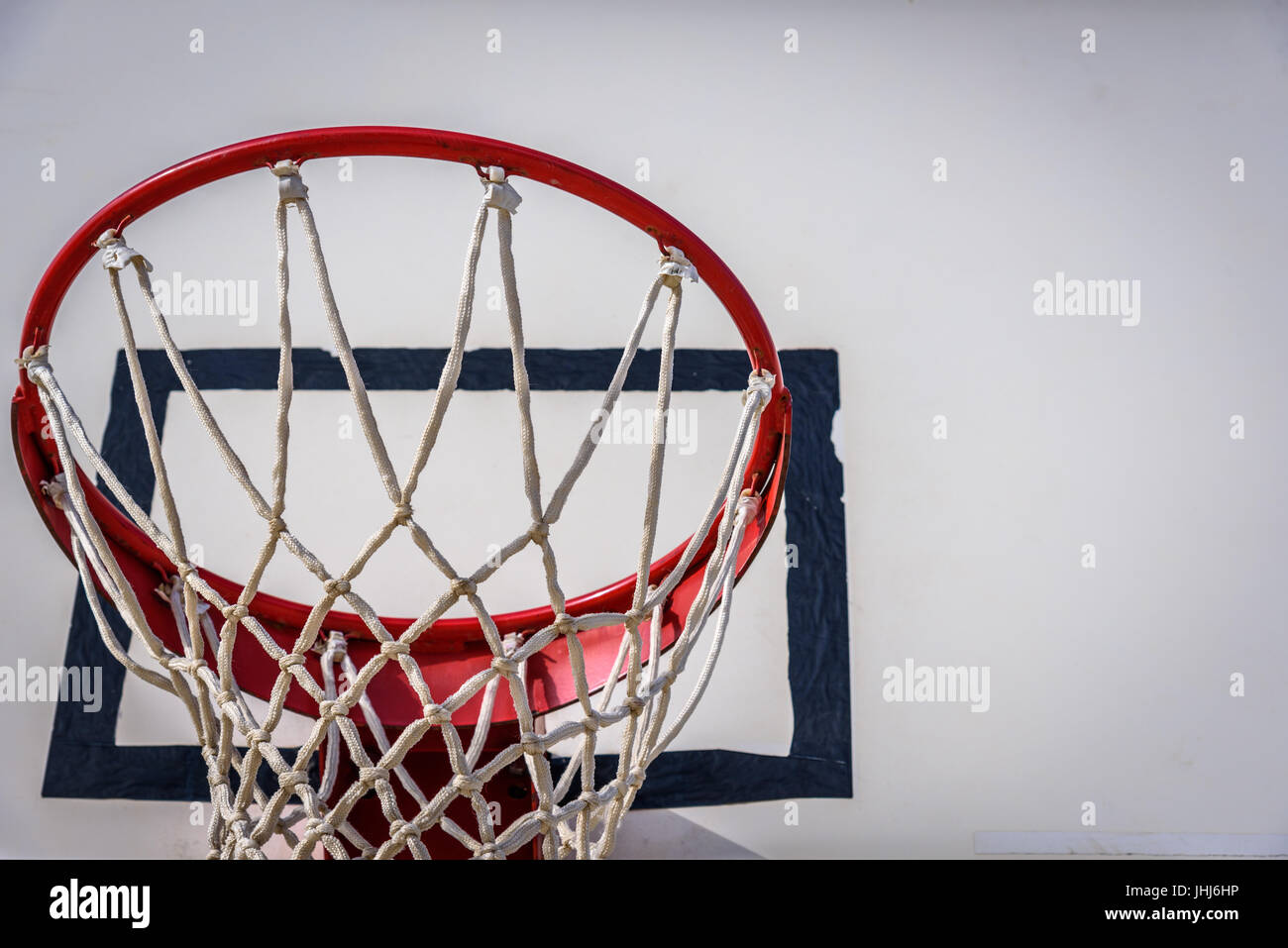 Basketball hoop with blue sky Stock Photo - Alamy