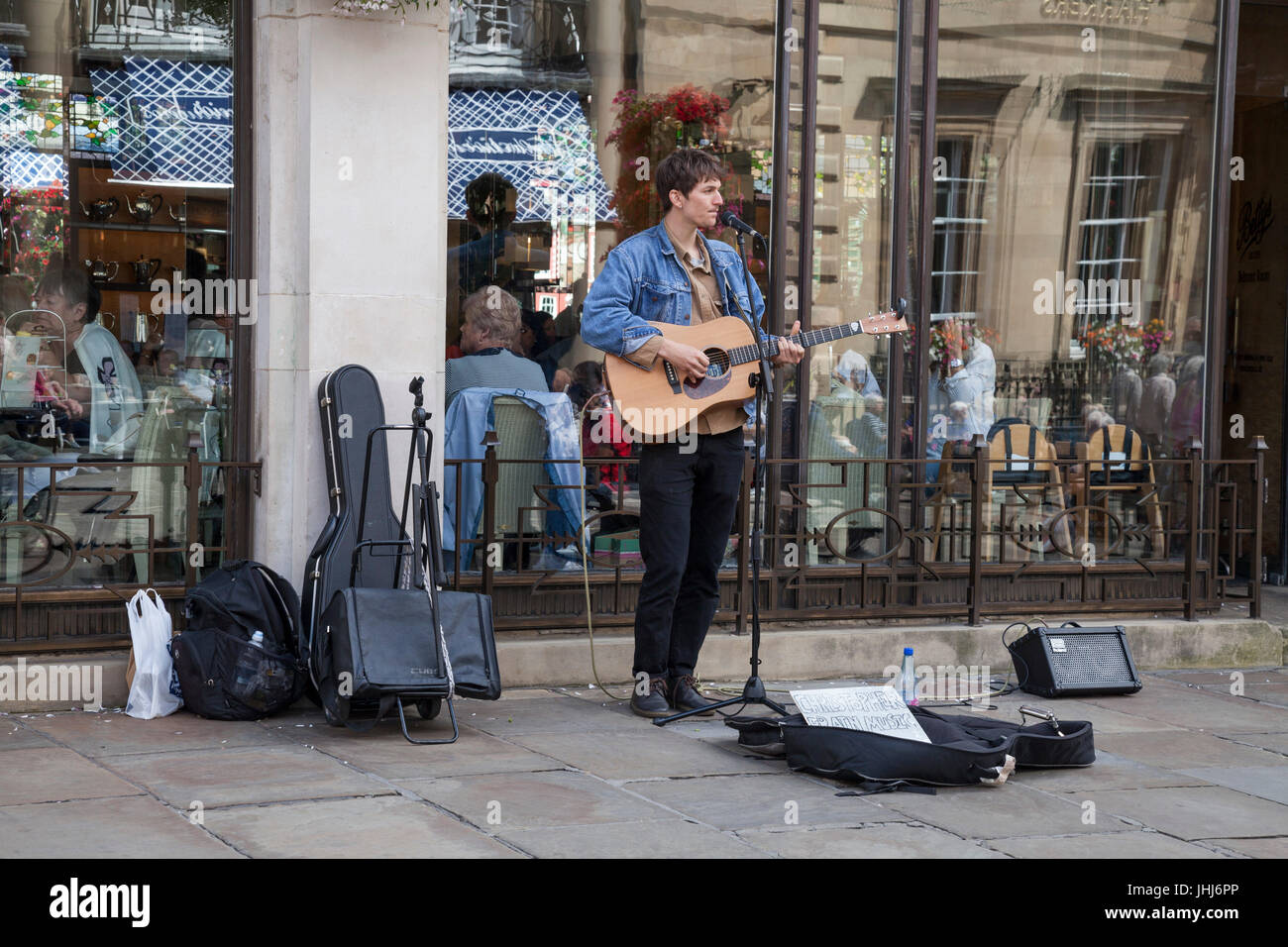 Male street busker guitar singing hi-res stock photography and images ...