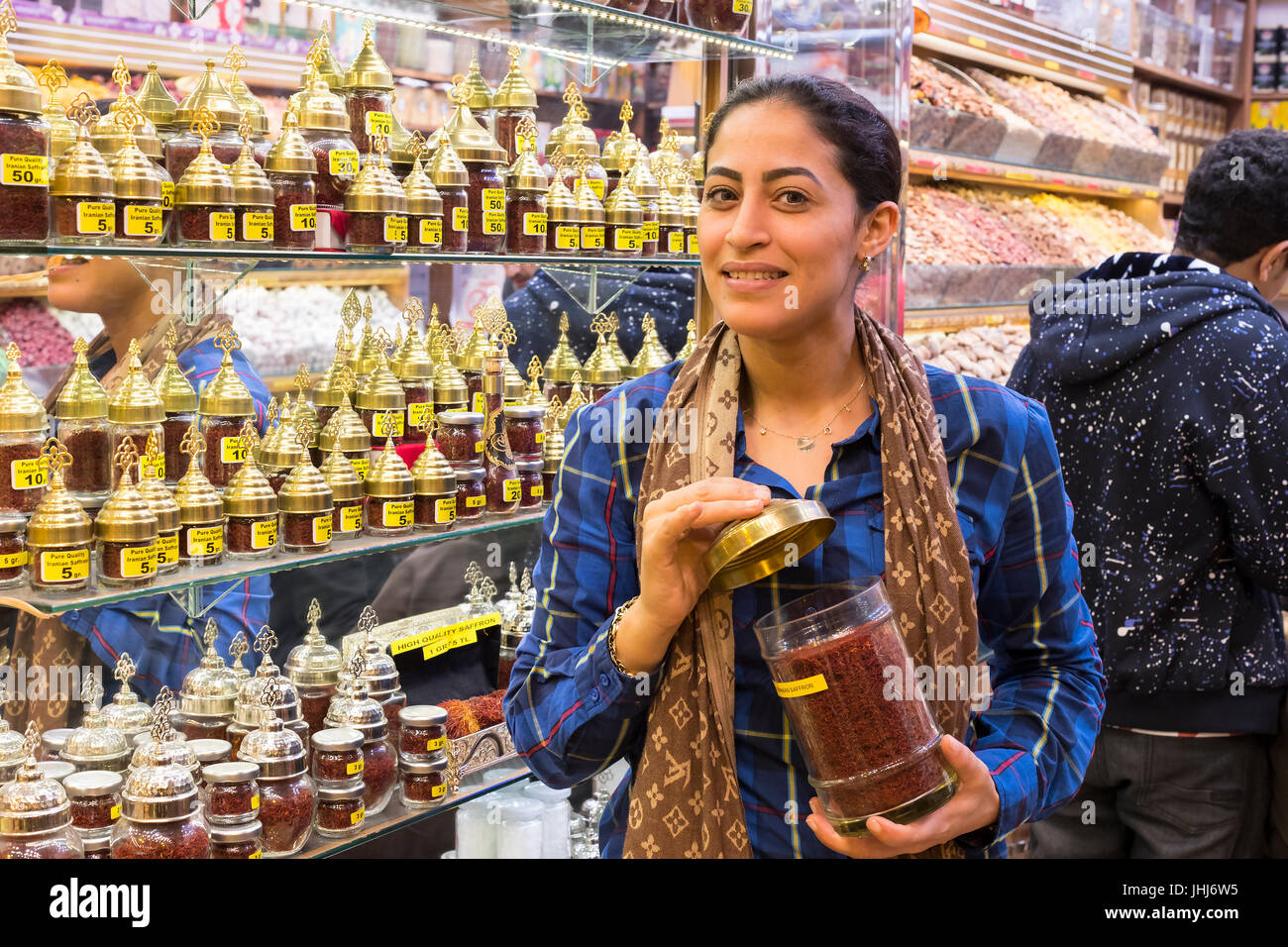ISTANBUL, TURKEY - 7 APRIL , 2017: Sellers of spices and sweets in the ...