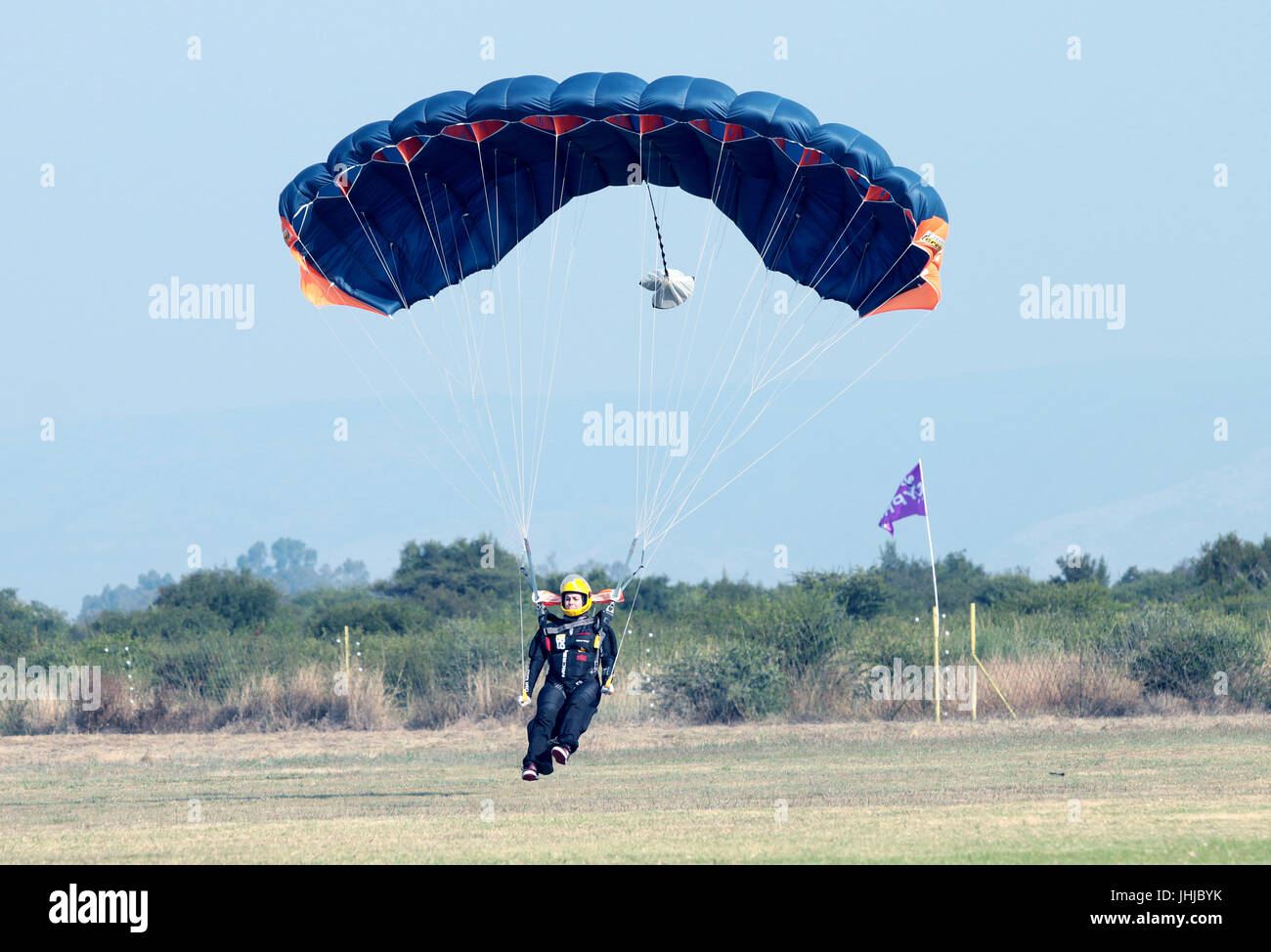 Female Parachutist Landing High Resolution Stock Photography and Images ...