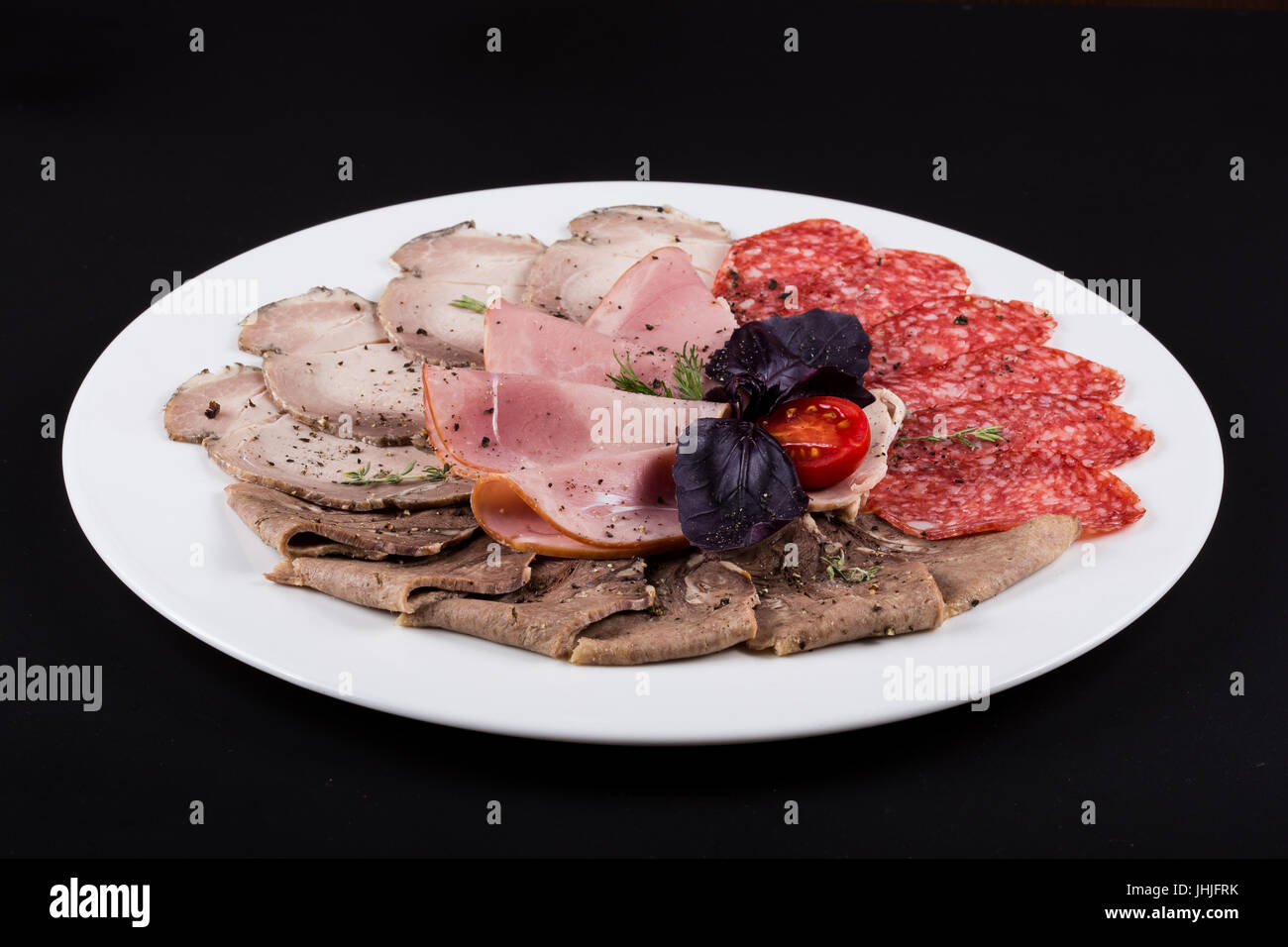 Black background cooked meat hi-res stock photography and images - Alamy