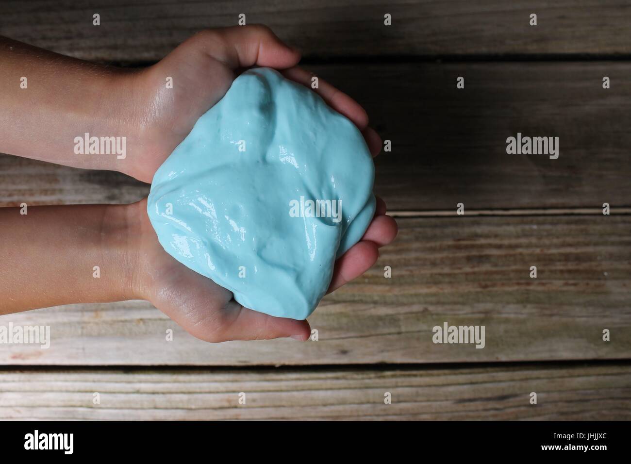 child playing with slime Stock Photo - Alamy