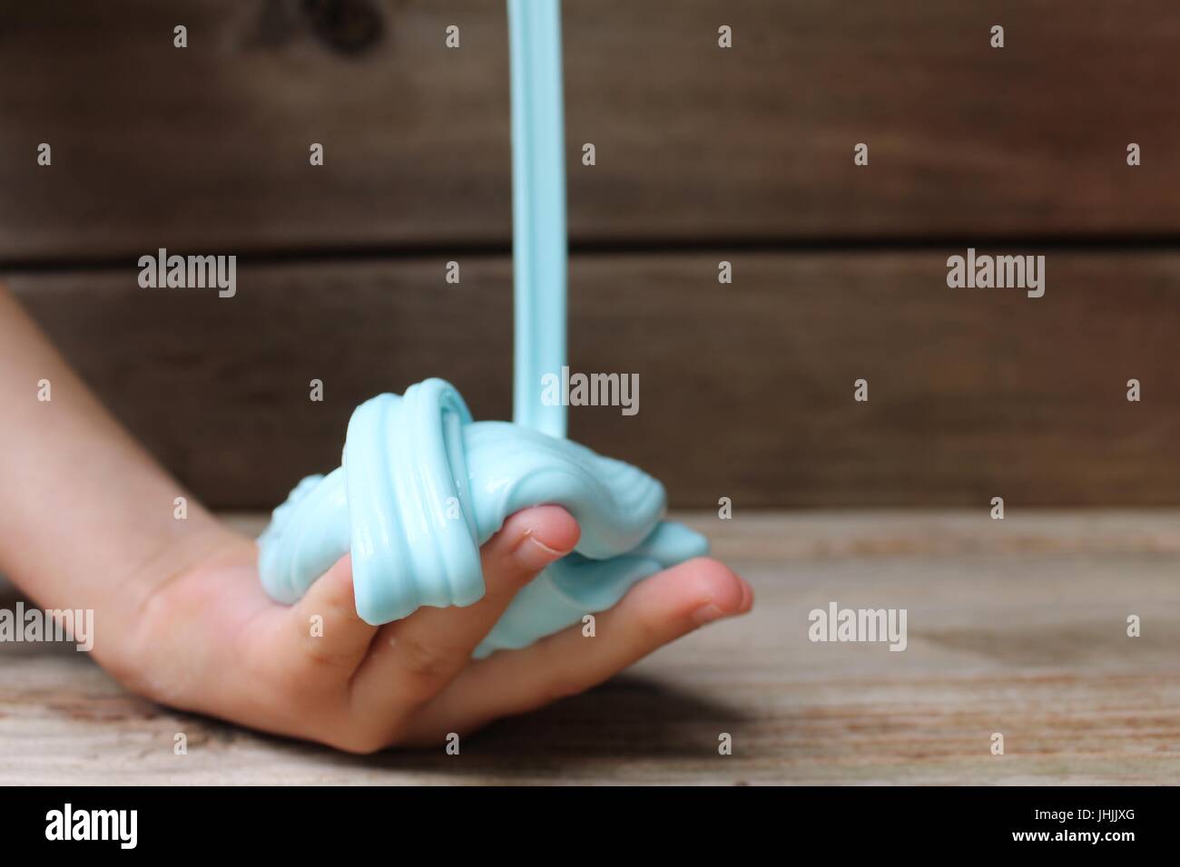 child playing with slime Stock Photo - Alamy