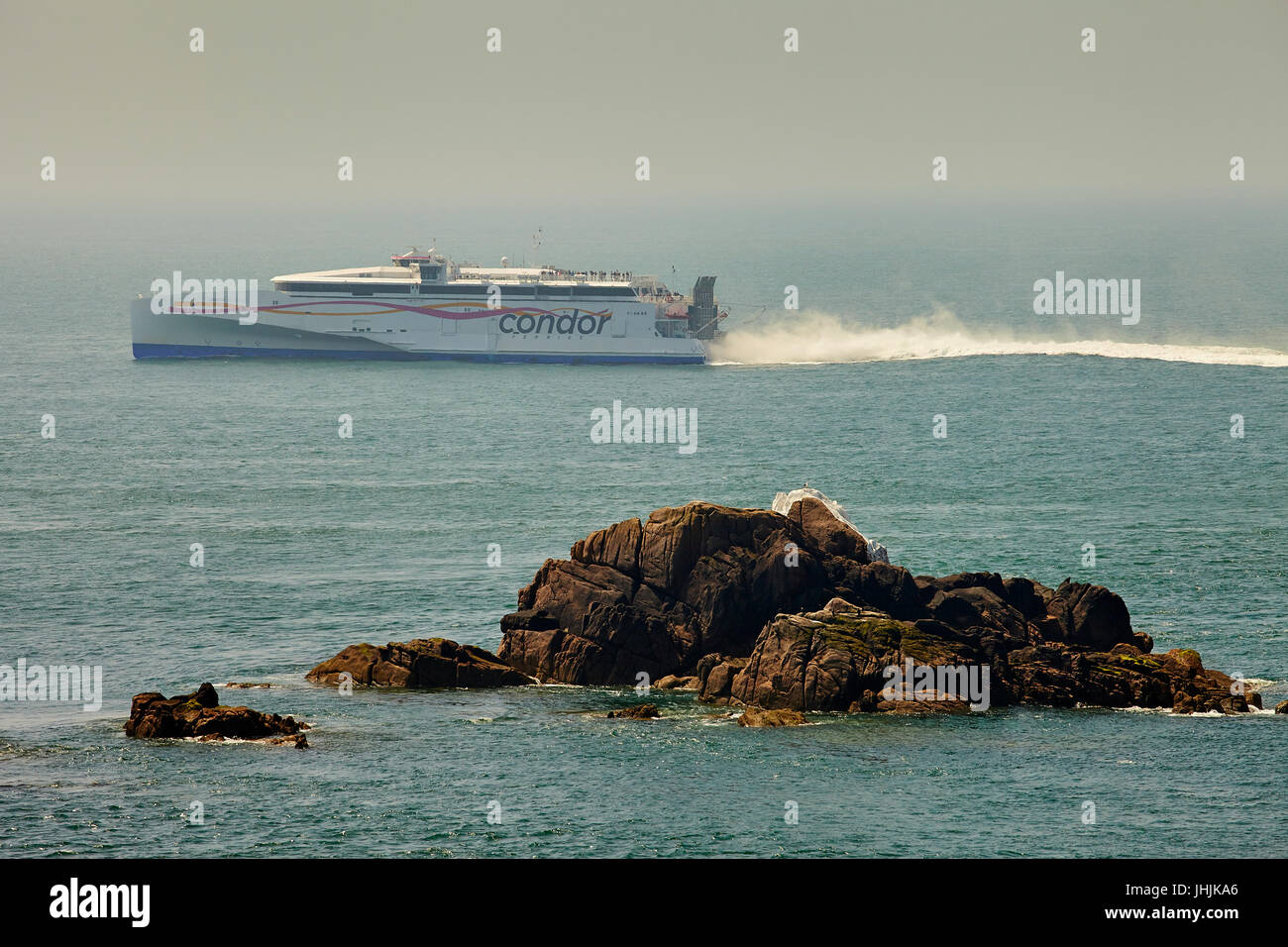 Condor Ferry at Corbiere Point, Jersey. C.I. All rights reserved Stock ...