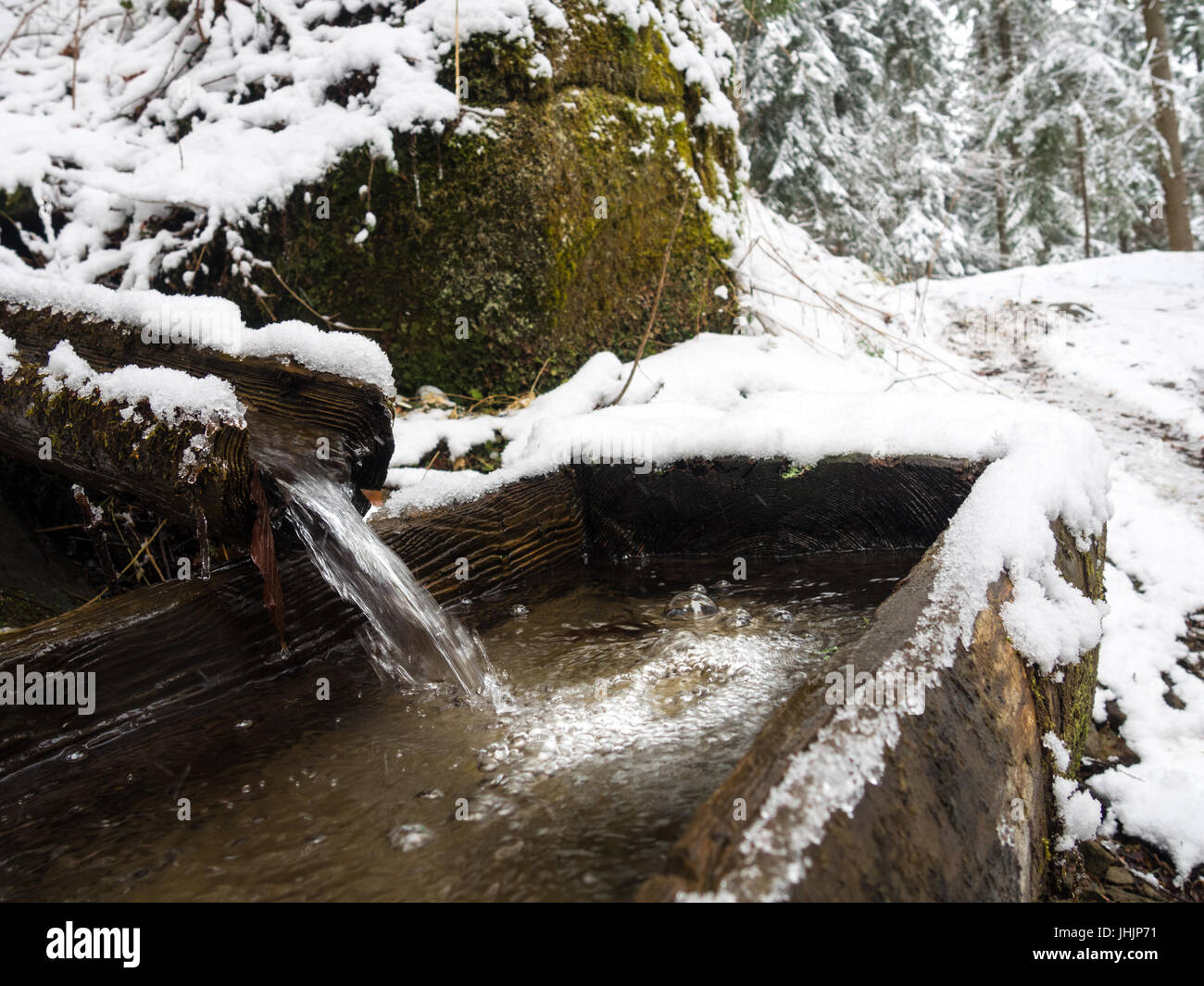 Wooden Water Trough In The Mountains High Resolution Stock Photography ...