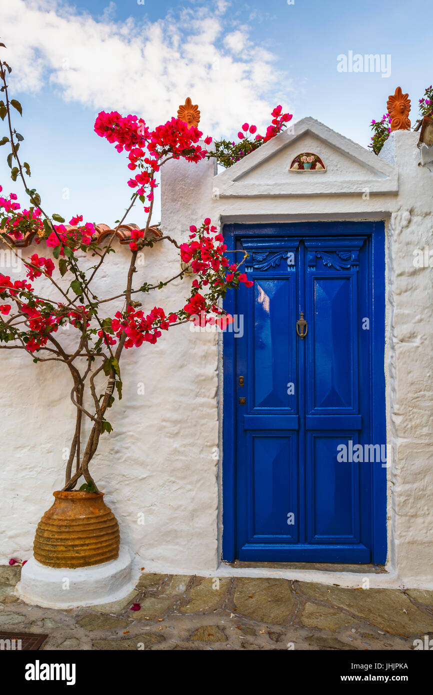 Gate with flowers in Skopelos town, Greece Stock Photo - Alamy