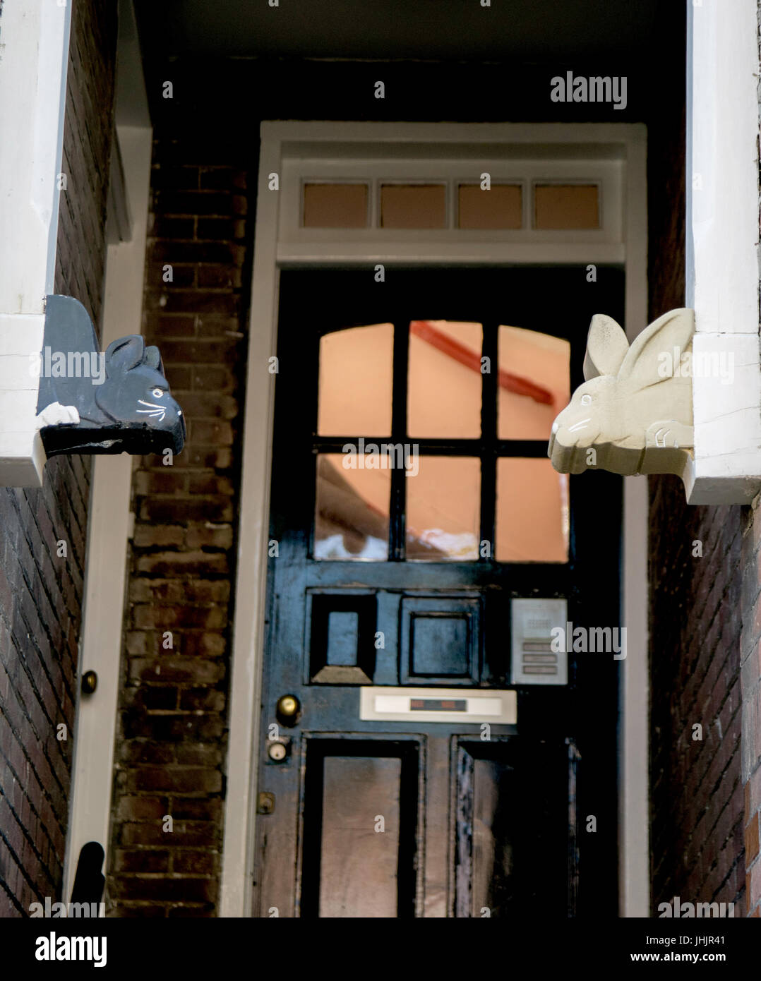 AMSTERDAM, NETHERLANDS - JUNE 03, 2017: House facade with two rabbits ...
