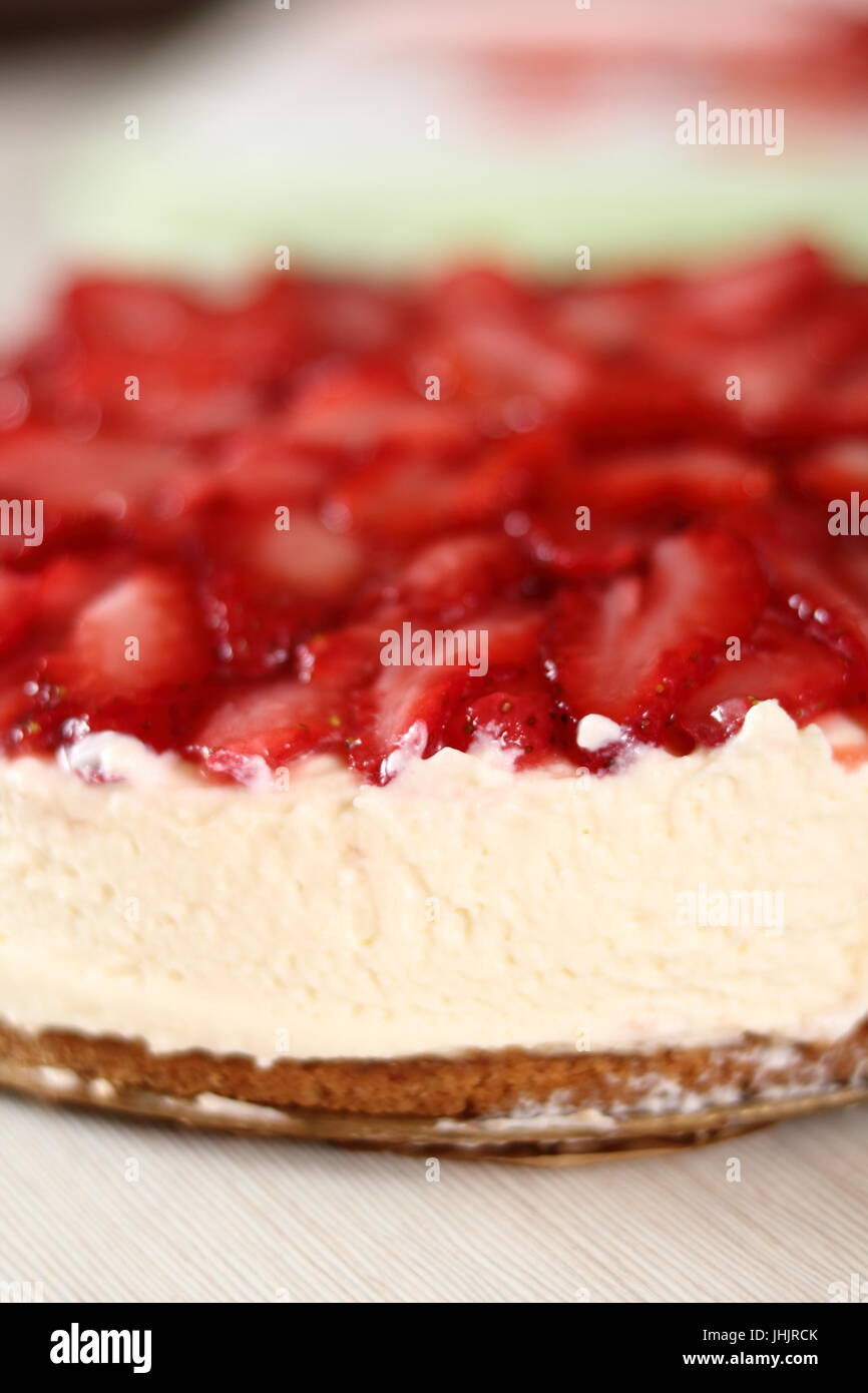 Cake ready to eat. Making frozen strawberry cheesecake series Stock ...