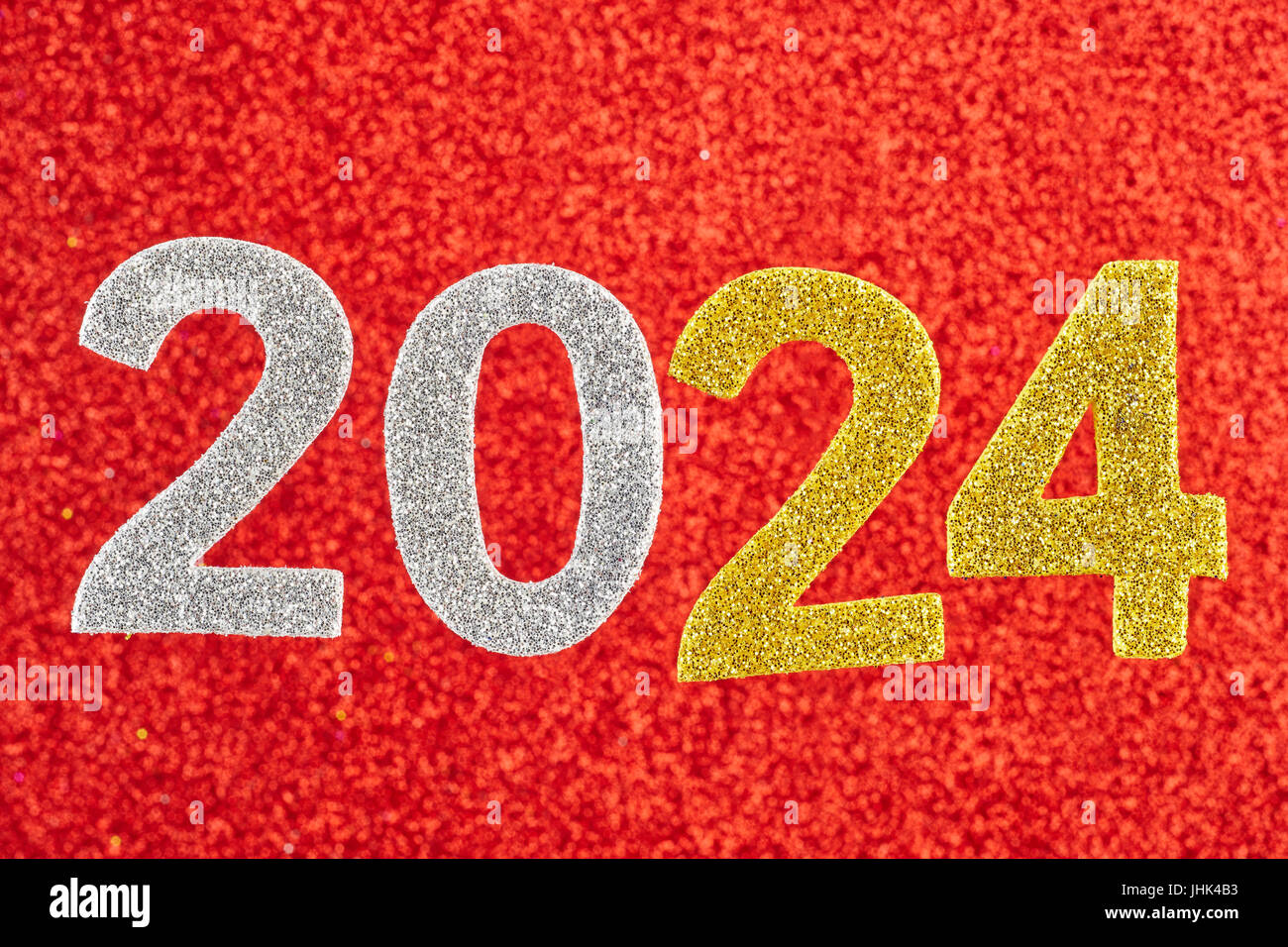 Number two thousand and twenty four over a red background. Anniversary ...