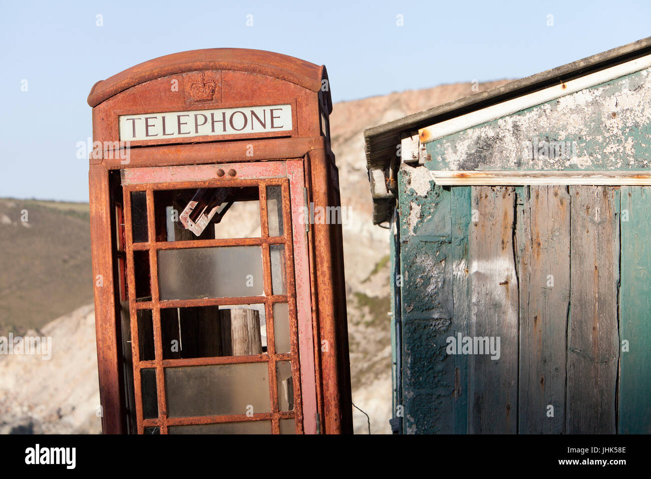 An old disused abandoned and unloved red phone box stands derelict next ...