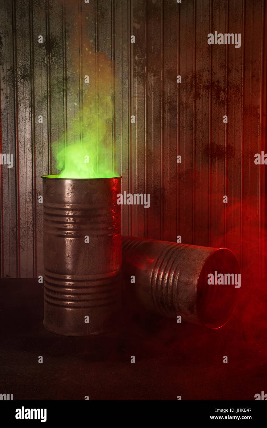 Old rusty barrels with toxic smoke, biohazard, post-apocalyptic concept ...