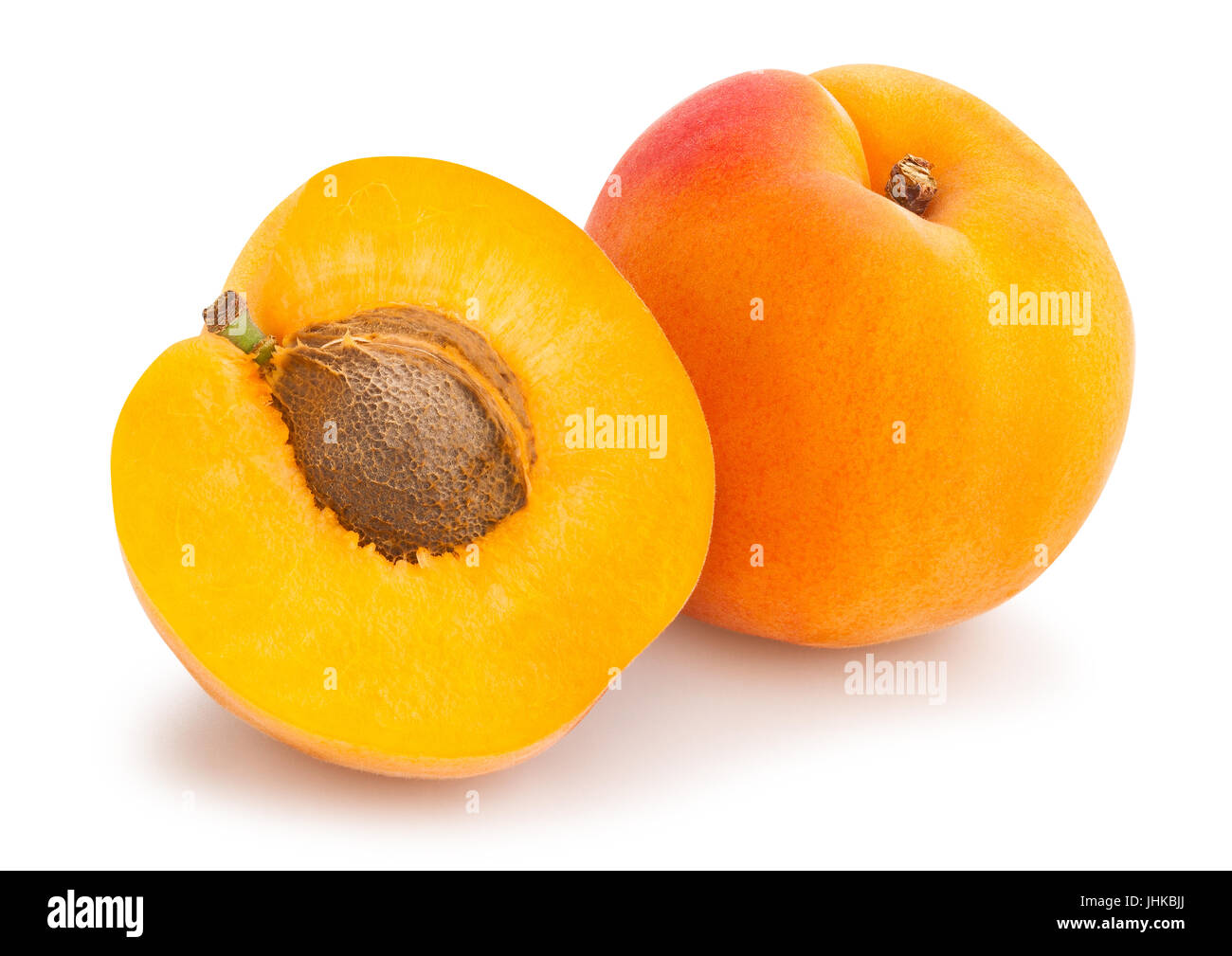 sliced apricot path isolated Stock Photo - Alamy