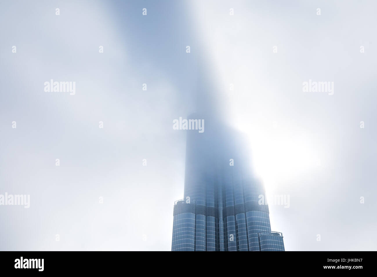 Dubai, UAE - Jun 3, 2017: Burj Khalifa casting a shadow through rare ...
