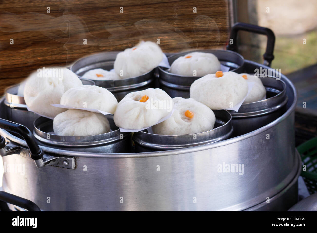 Chinese dumplings(steamed stuff bun) being steamed in steam box Stock ...