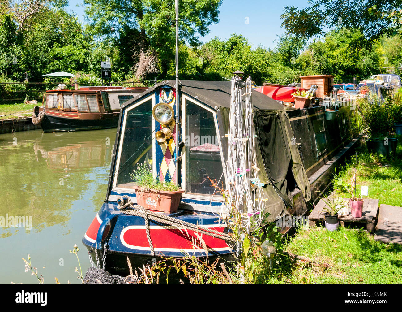 Colourful narrow boats on the Grand Union Canal at Marsworth, in the ...