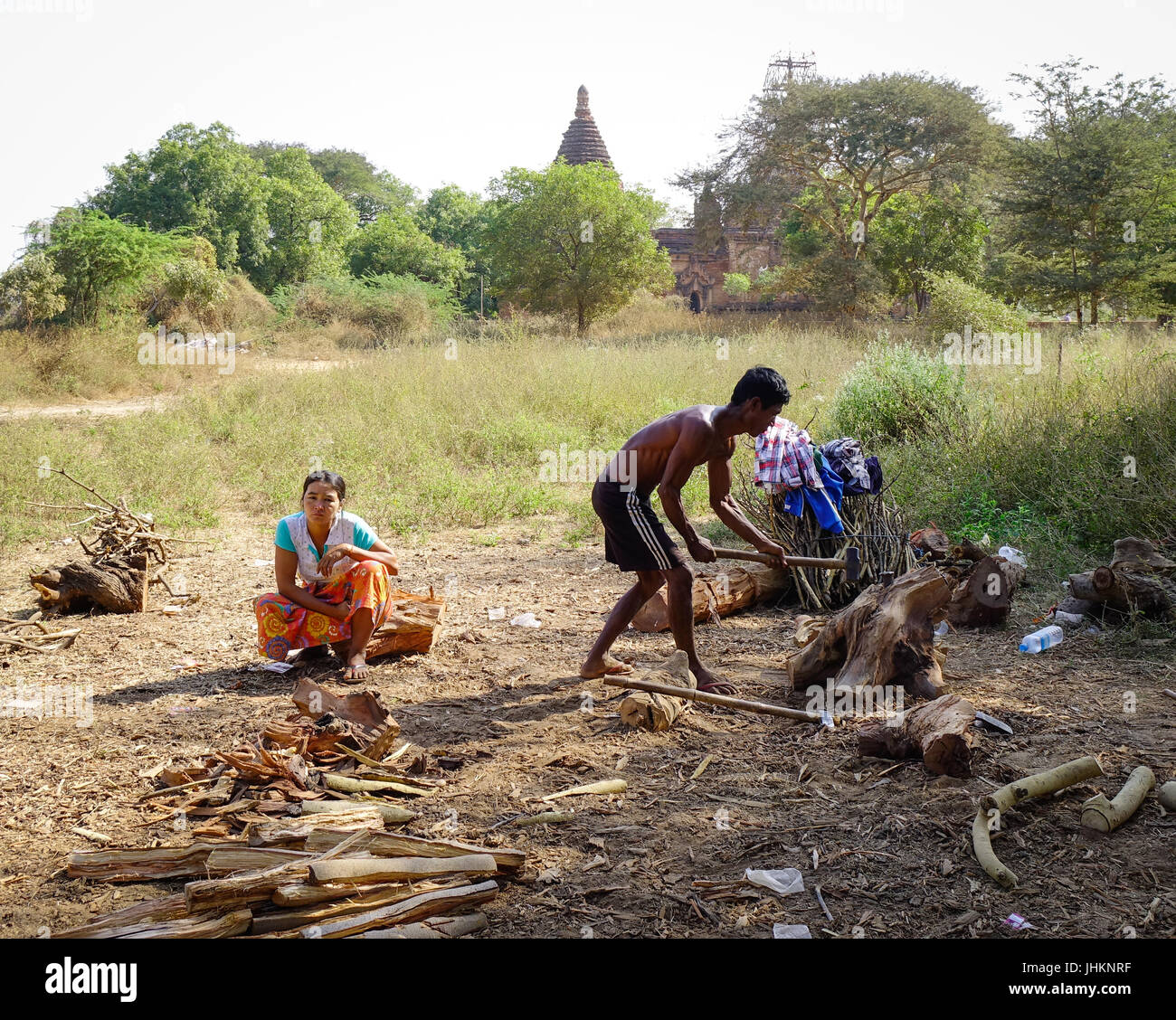 Bagan, Myanmar - Feb 3, 2017. People split firewood on the field in ...
