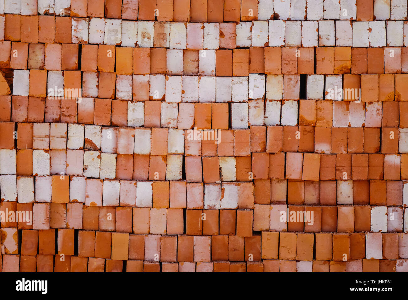 Pile of bricks at the construction site, background, texture Stock ...