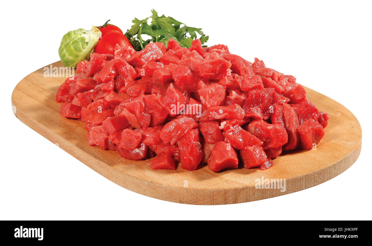 fresh raw red cubed meat chunk on wooden cut board isolated over white ...