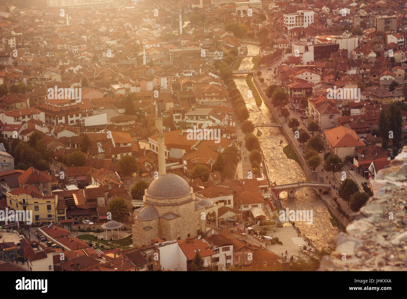 old and cultural city of Prizren, Kosovo with the golden river in the ...