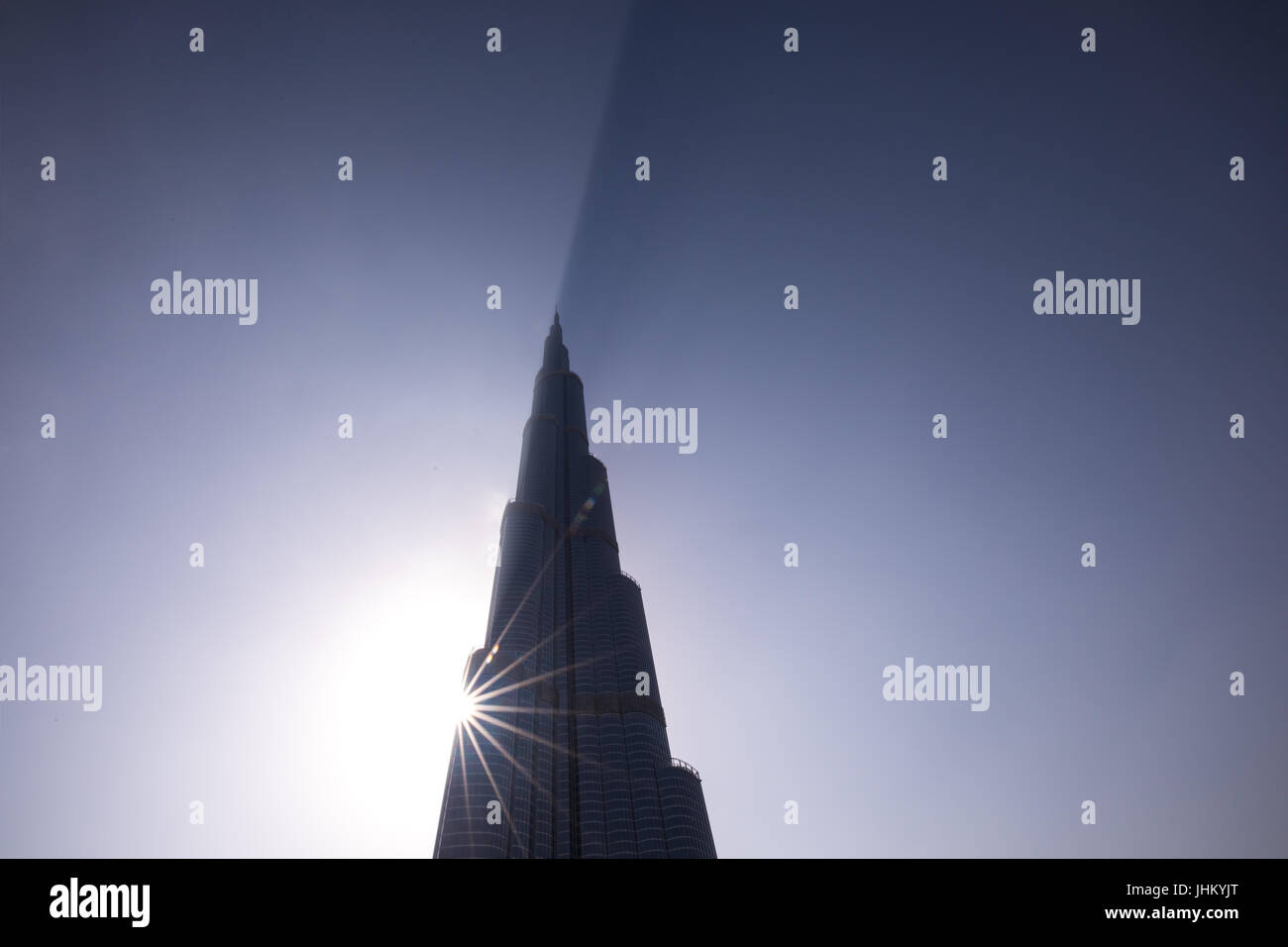 Dubai, UAE - Jun 3, 2017: Burj Khalifa casting a shadow through rare ...