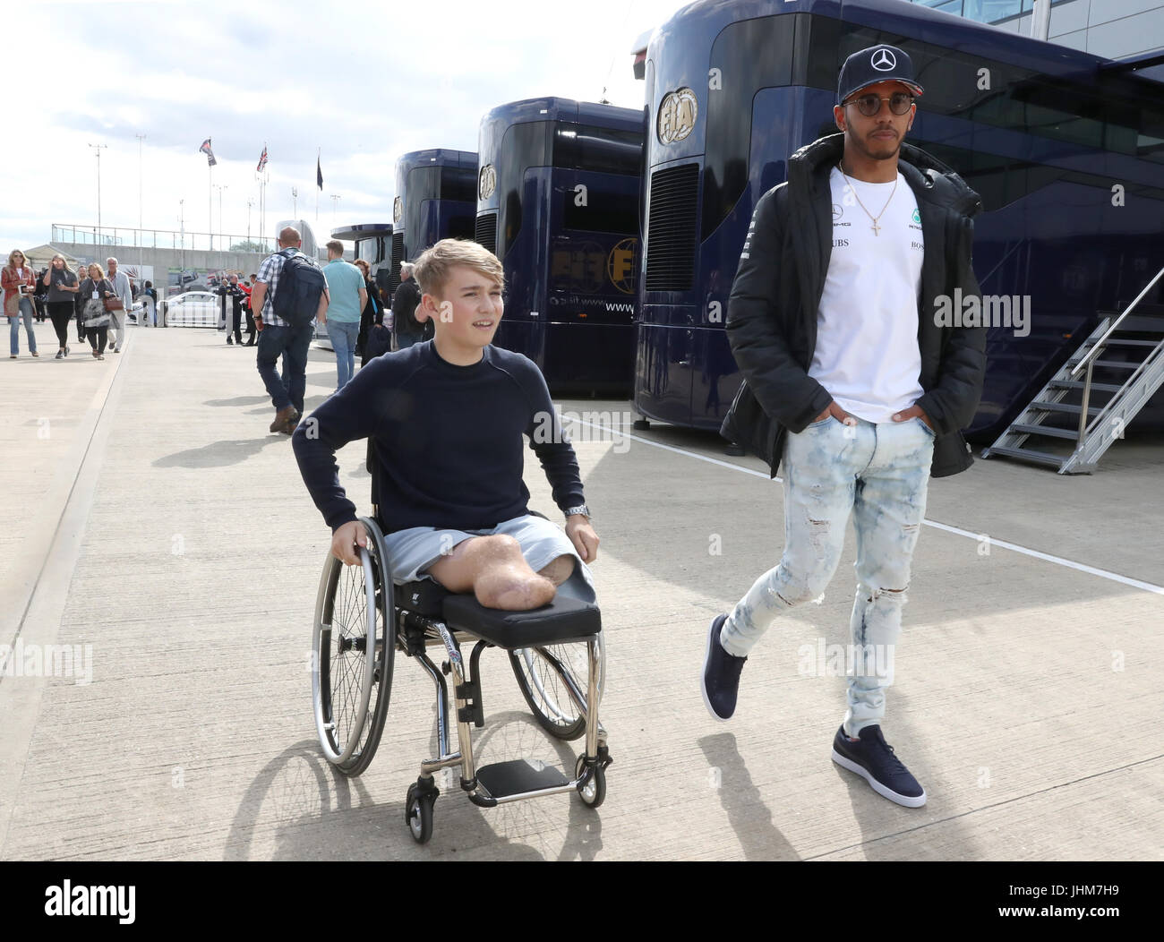 Merecedes' Lewis Hamilton (left) and amputee teenage Racing driver ...