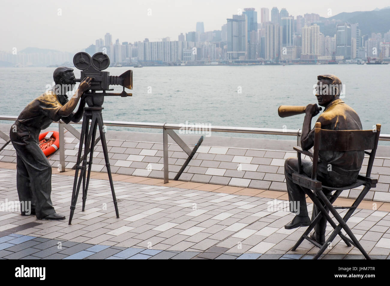 A bronze sculpture of a movie set on the Avenue of the Stars, Kowloon ...